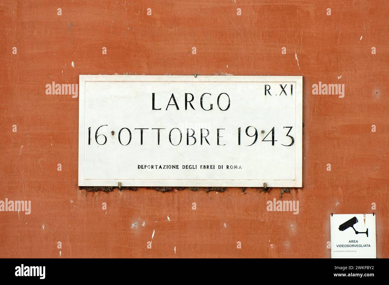 Marble street sign dedicated to jewish people deported to Auschwitz on ...