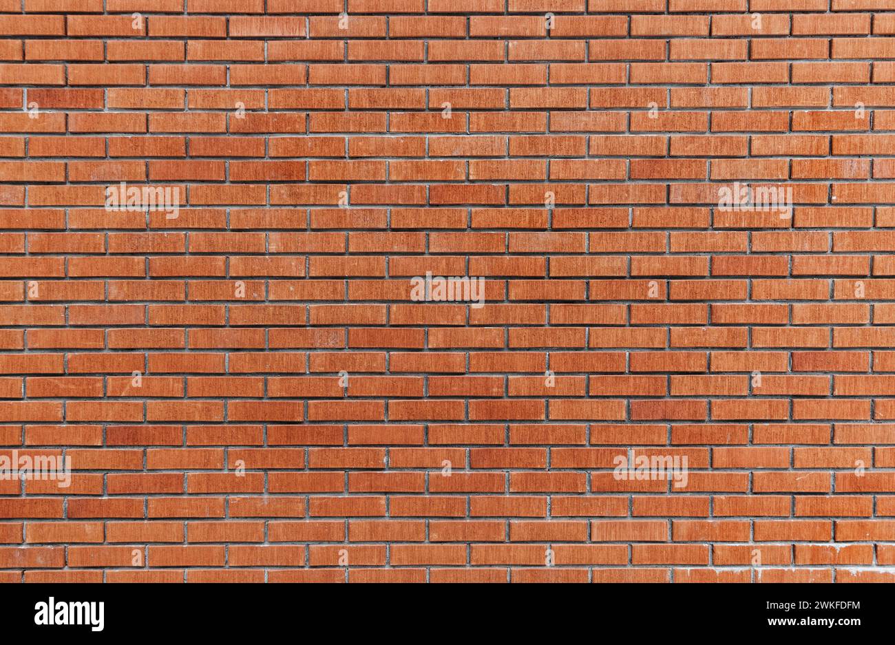 Red brick wall, front view, background photo texture Stock Photo - Alamy