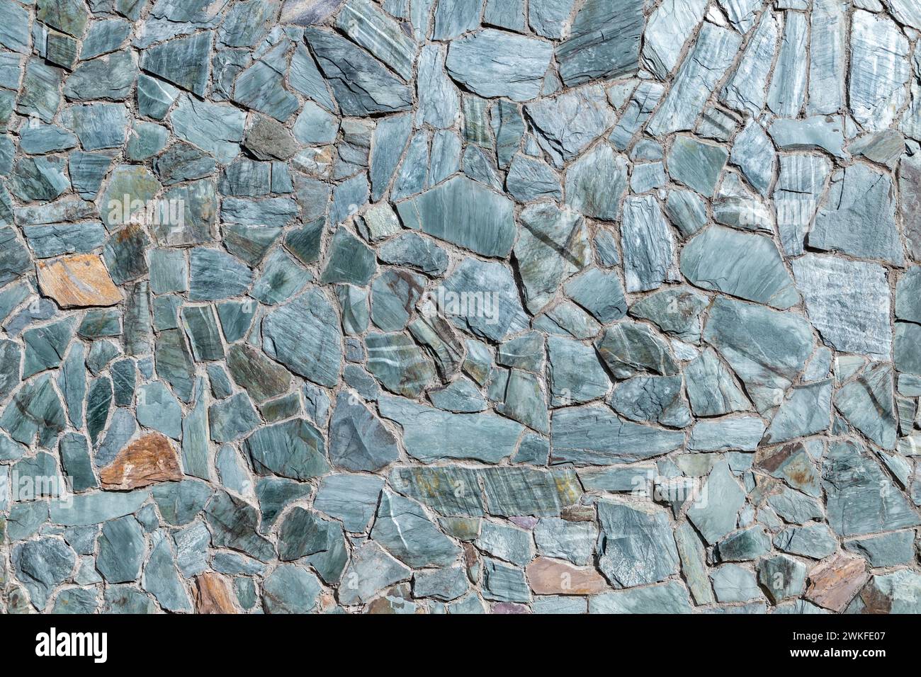 Mosaic green stone wall pattern, front view, background photo texture ...
