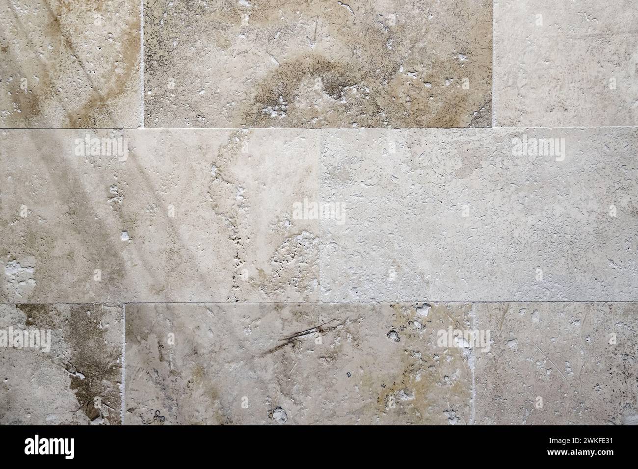 Beige stone wall. Background photo texture, close up front view Stock ...