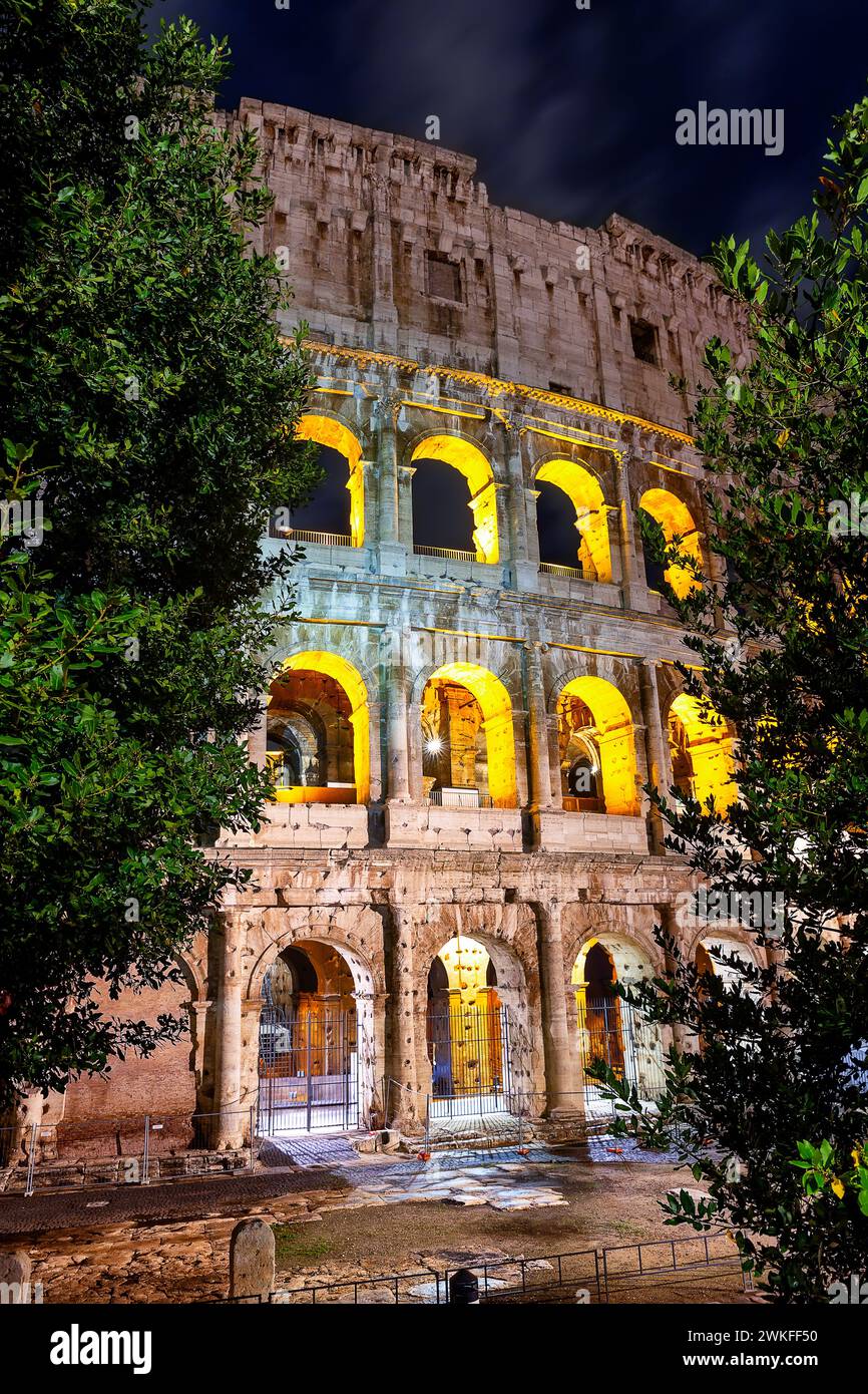 Arches of Rome Colosseum (Flavian Amphiteater) illuminated at night ...