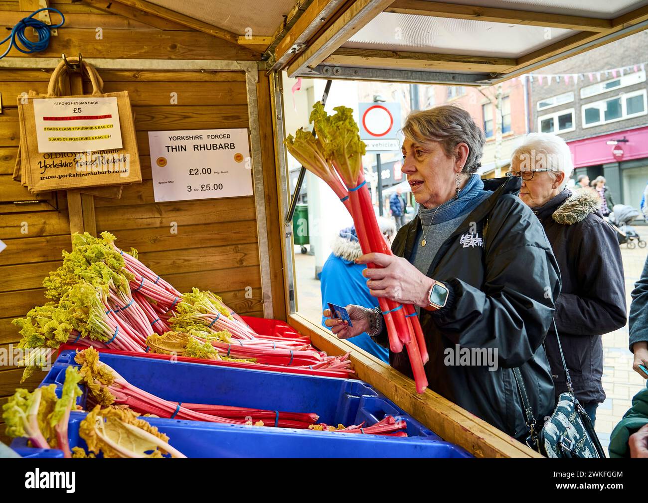 The Wakefield Rhubarb Festival 2024. A Custumer making a purchase at ...