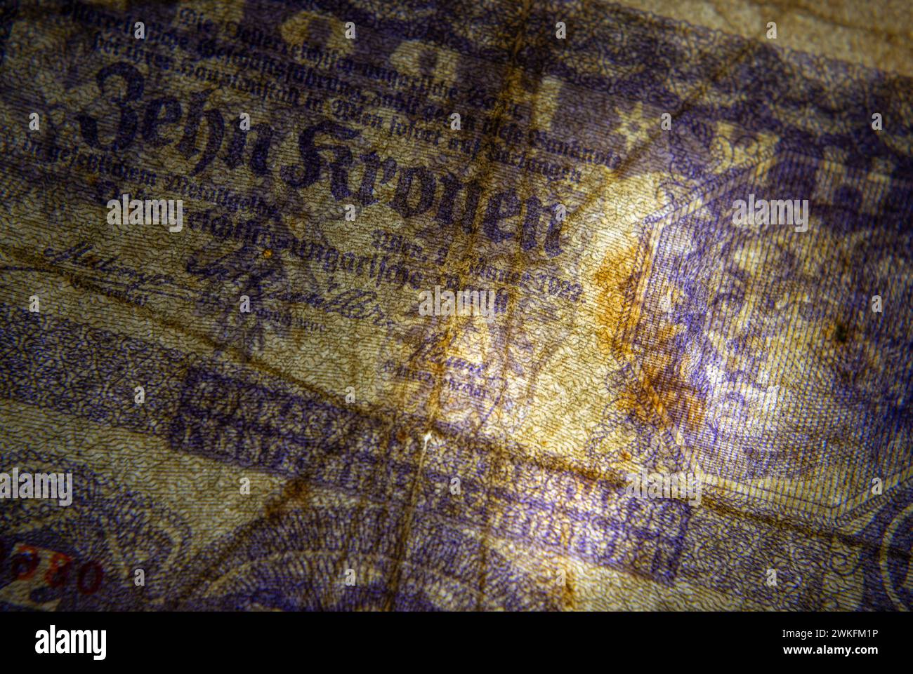 Vintage postage stamp with weathered surface and numerous scratches ...