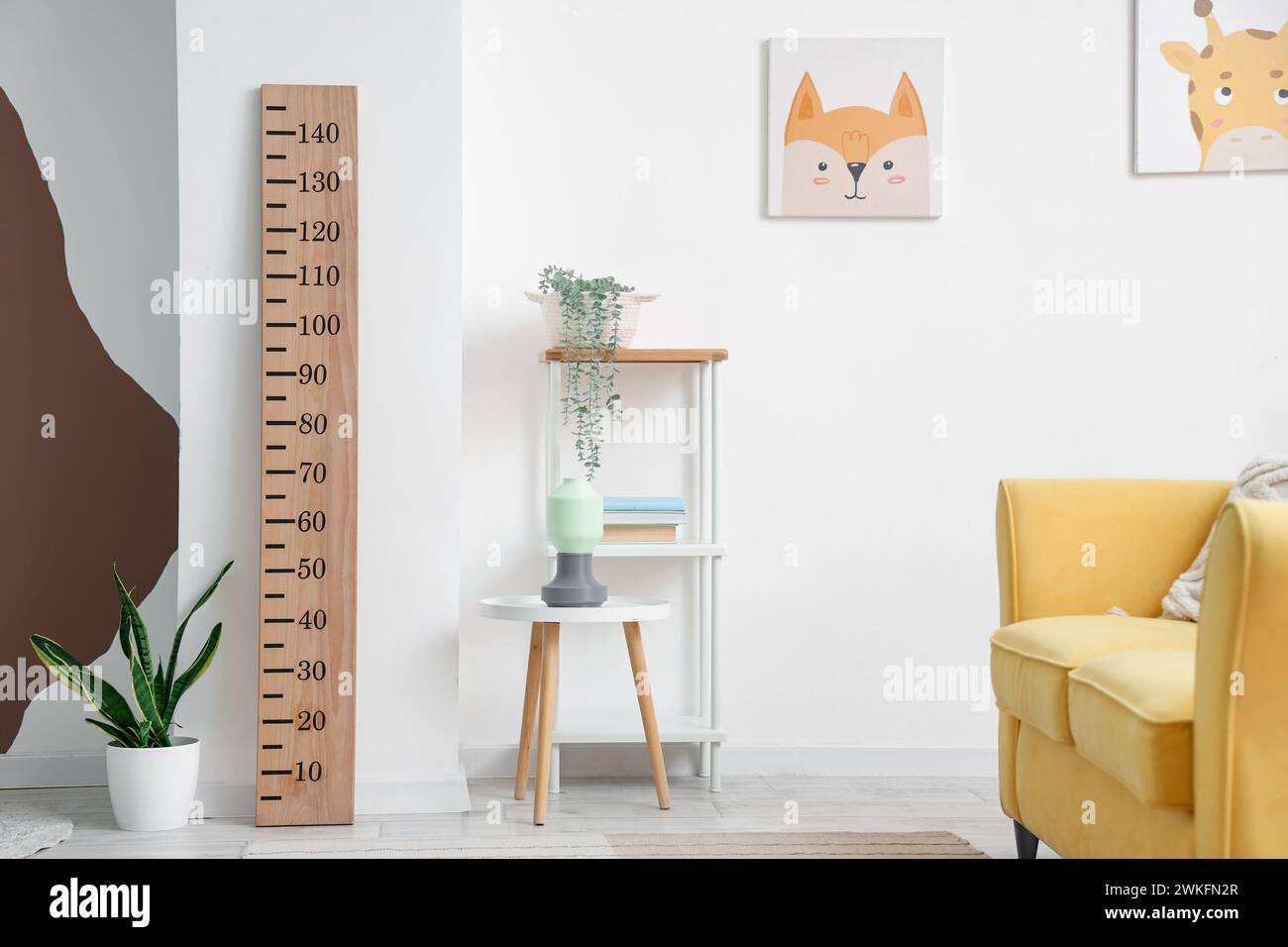 Interior of modern children's room with wooden stadiometer Stock Photo ...