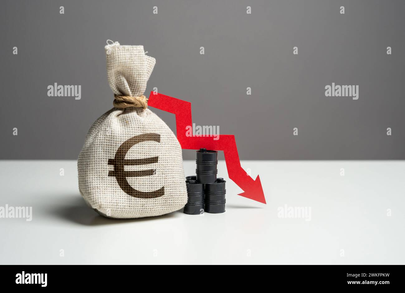 Oil barrels and euro money bag and red arrow down. Falling profit from ...
