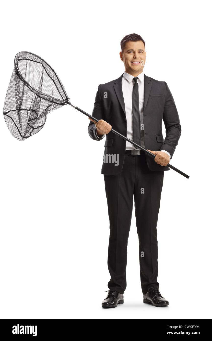 Businessman standing and holding a catching net isolated on white ...