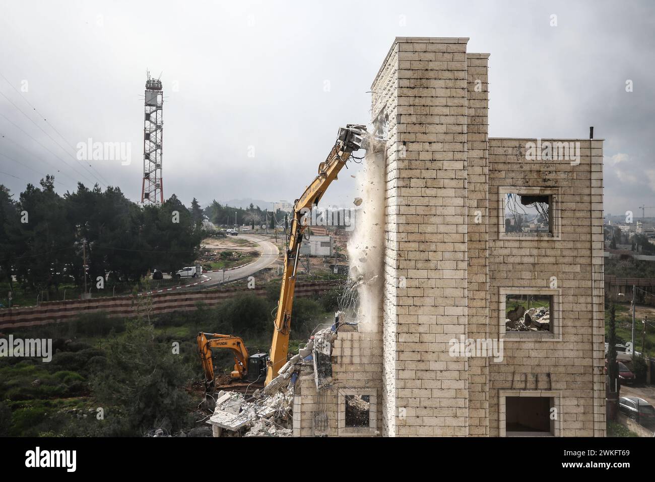 Israeli military excavator demolishs the house of the Palestinian "Abu ...