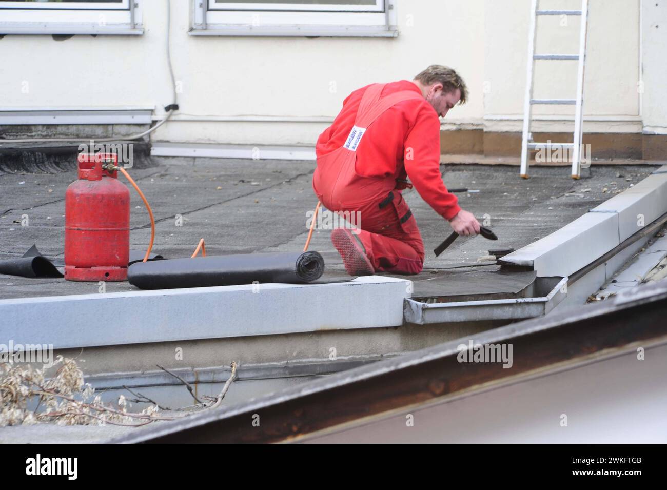 a blackdecker sealing or waterproofing a roof to prevent damage ...