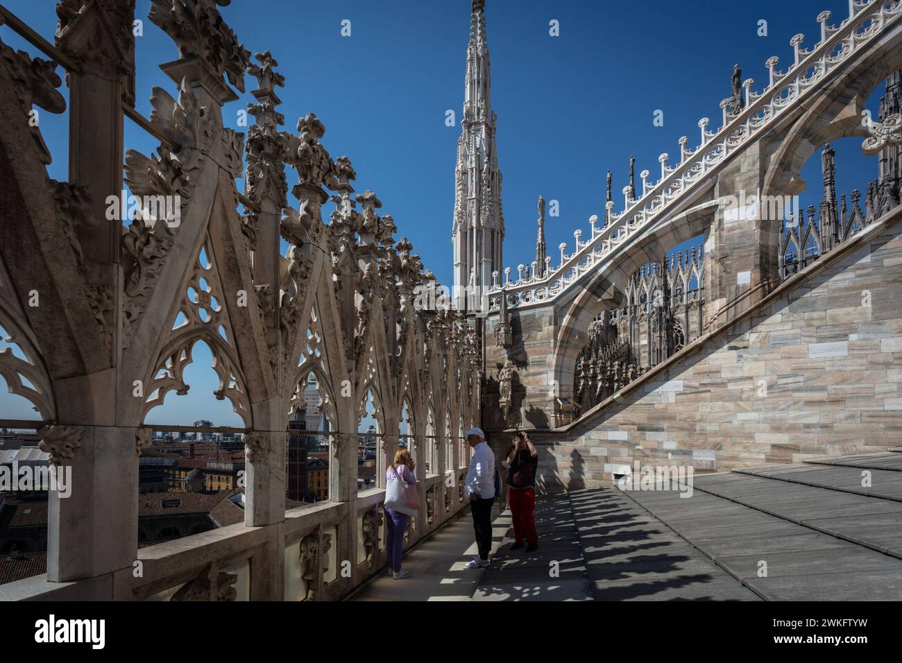Spikes from the Duomo, the gothic cathedral of Milan. Italy Stock Photo ...