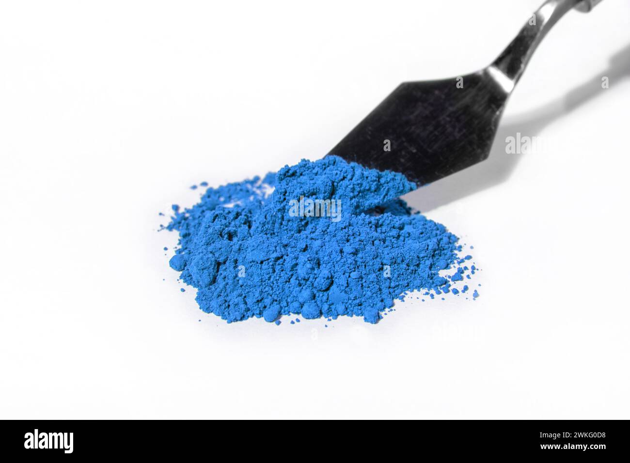 ceruleum blue pigment, dry natural paint on a white background, macro ...