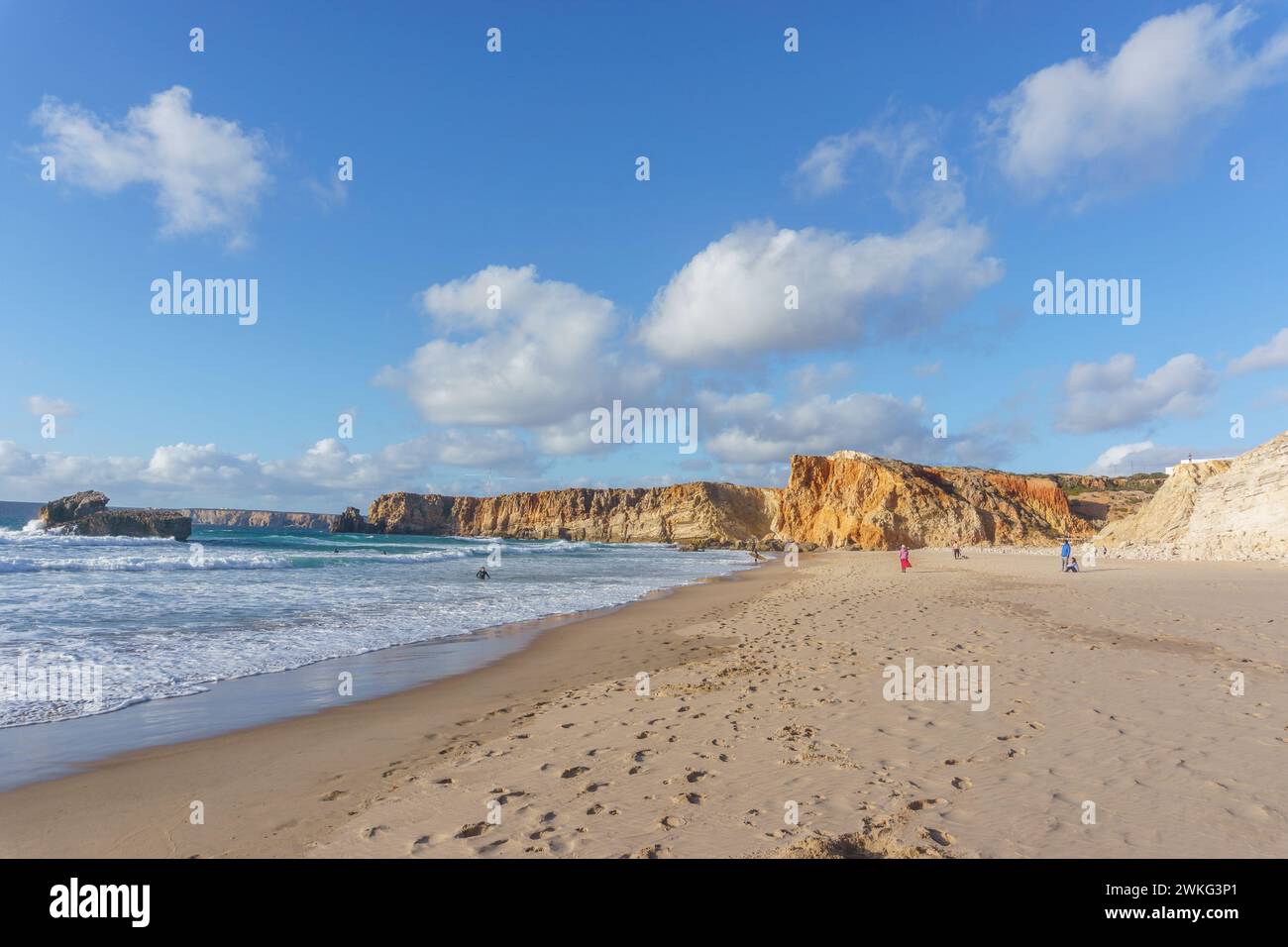 Rock formations in golden sunlight at Praia do Tonel beach, Sagres ...