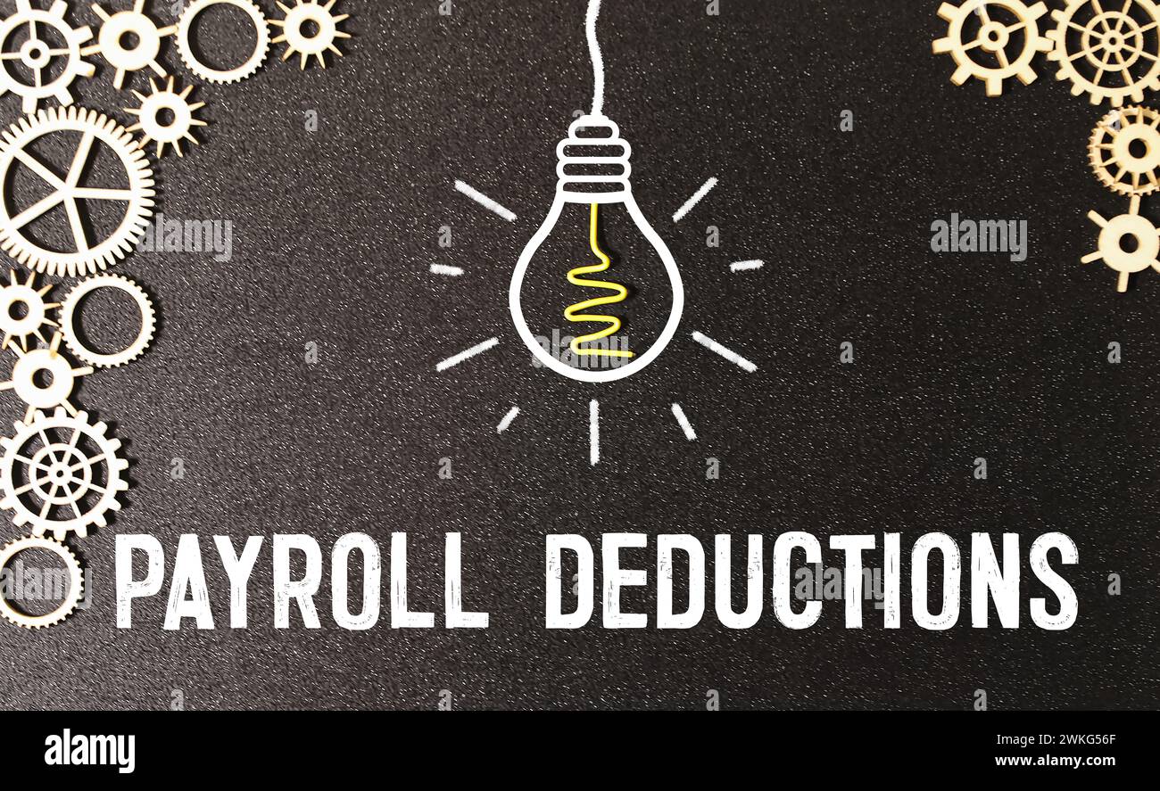 Selective focus. Calculator,pencil and banknotes with the word Payroll ...