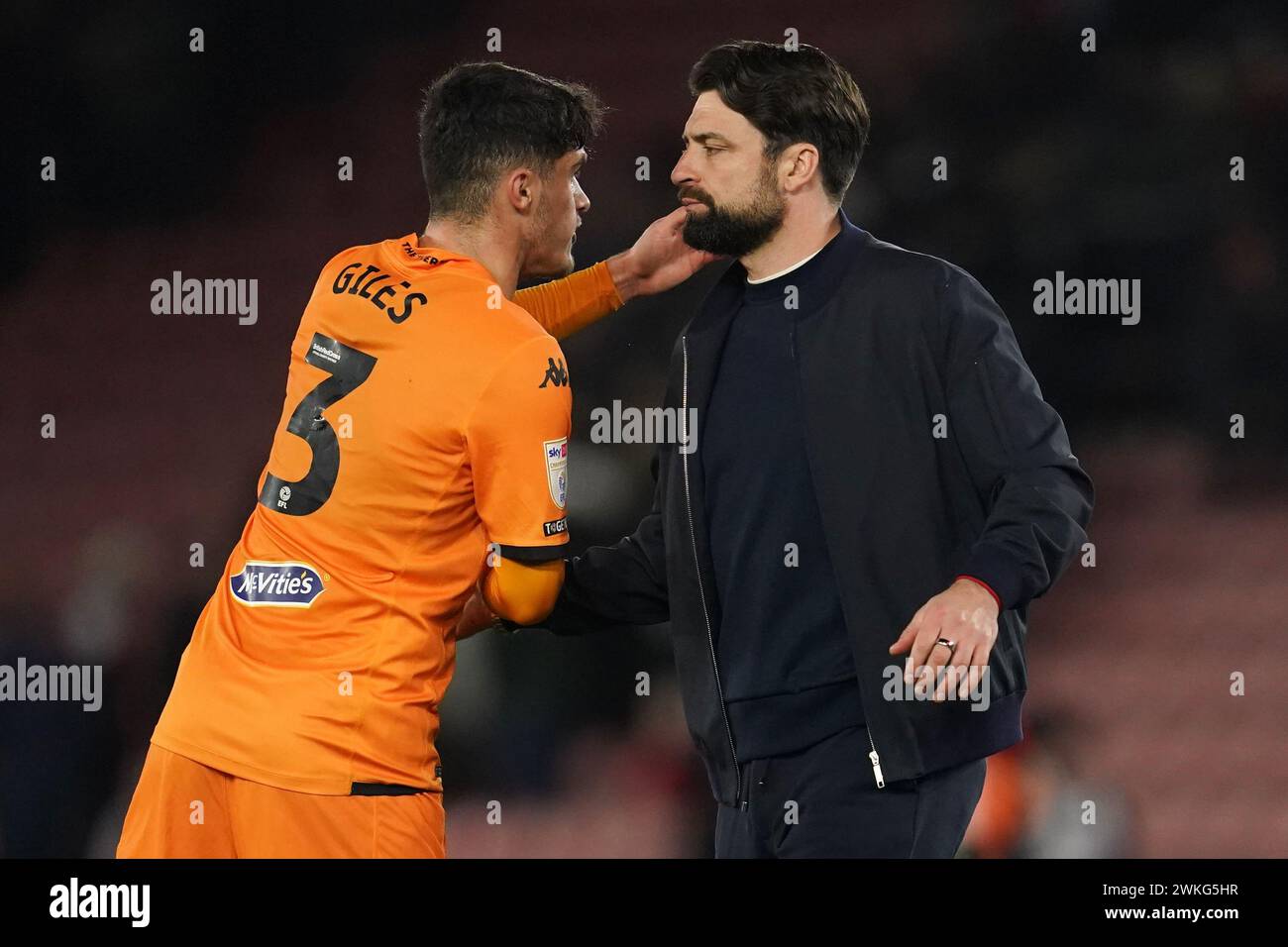 Hull City's Ryan Giles (left) with Southampton manager Russell Martin ...