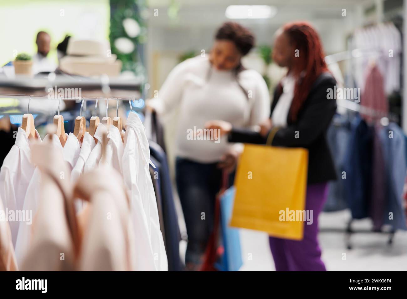 Formal female apparel hanging hi-res stock photography and images - Alamy