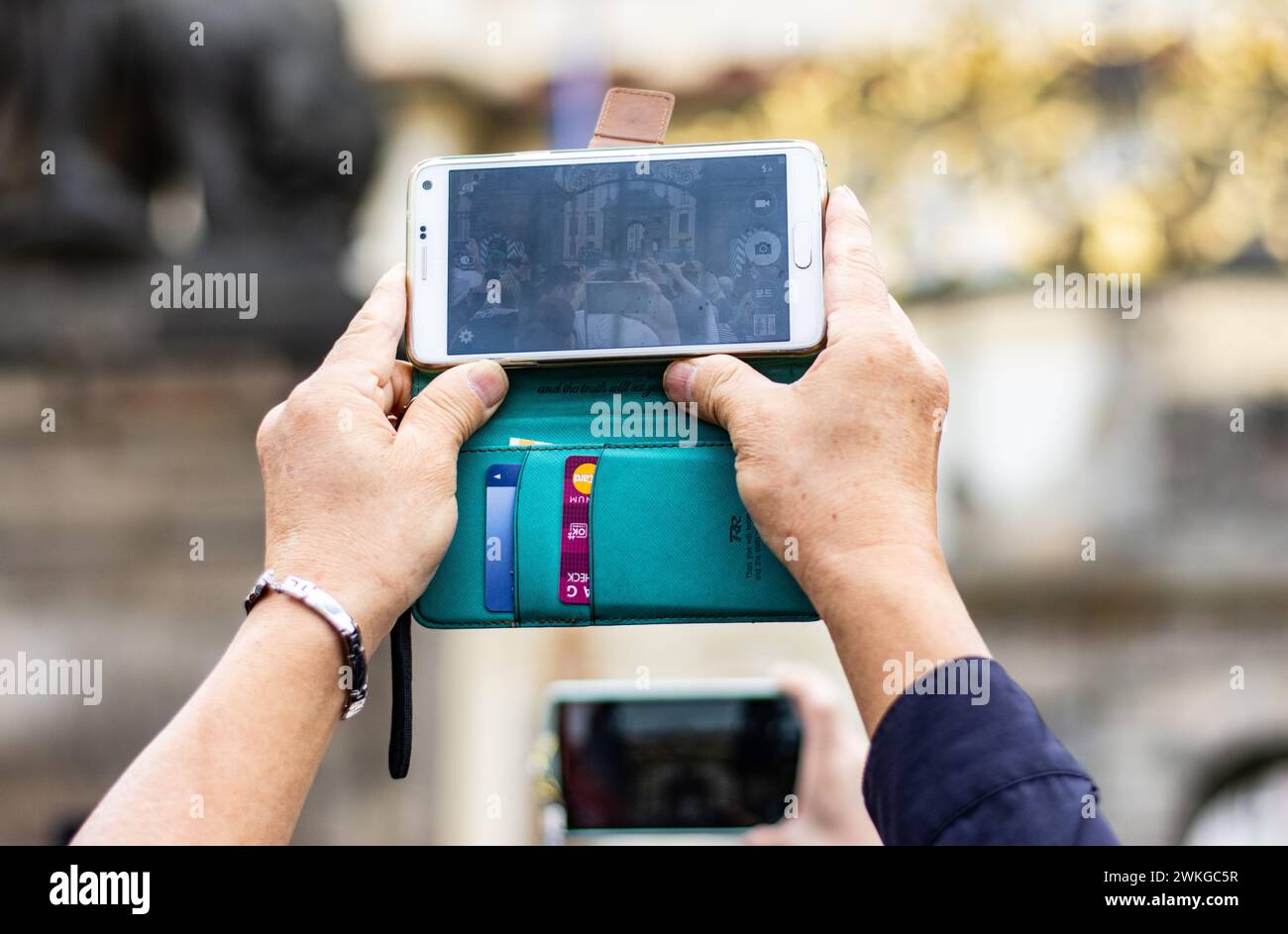 A woman taking photos Stock Photo - Alamy