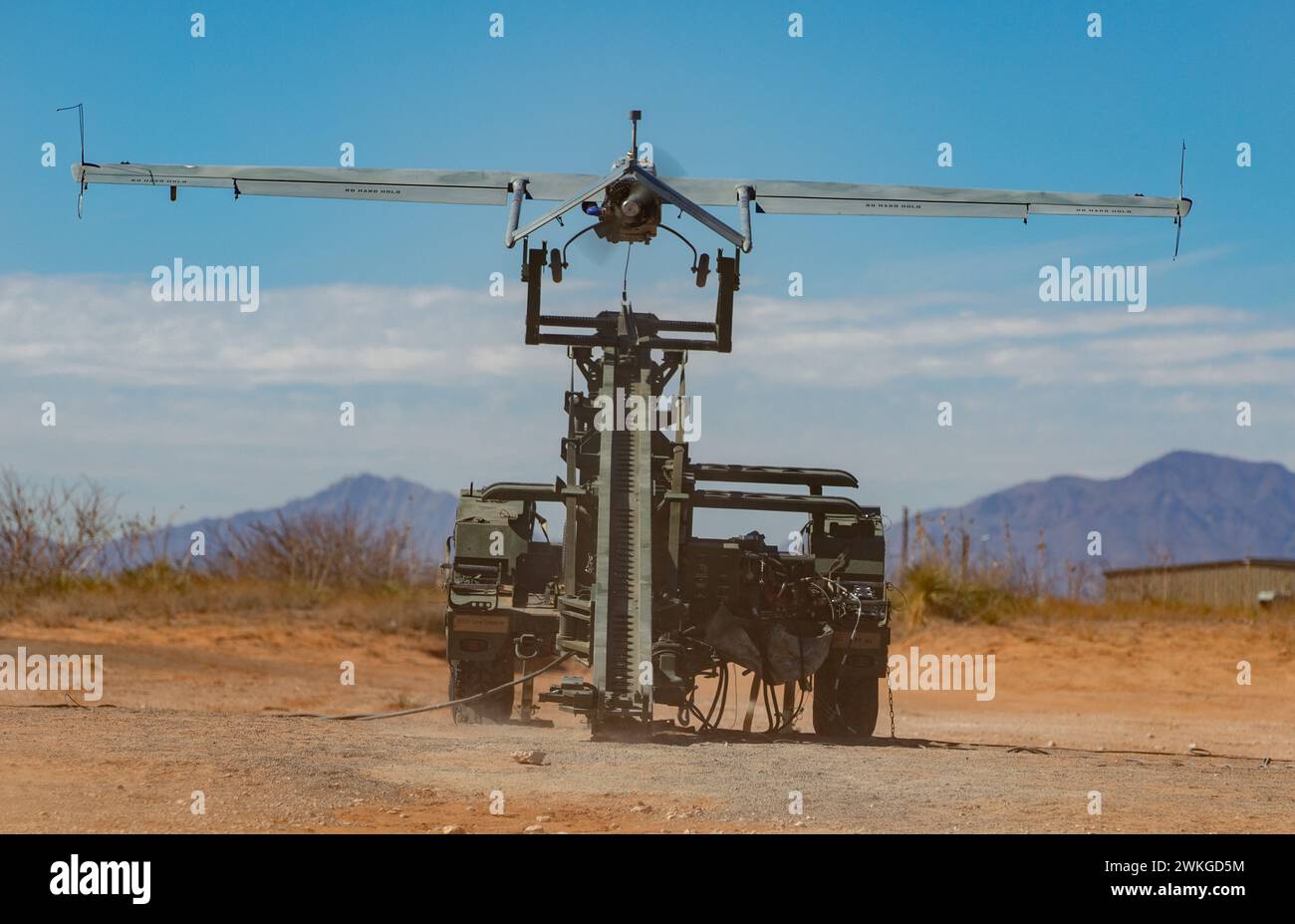 An AAI RQ-7 Shadow unmanned aerial vehicle is launched by U.S. Army ...