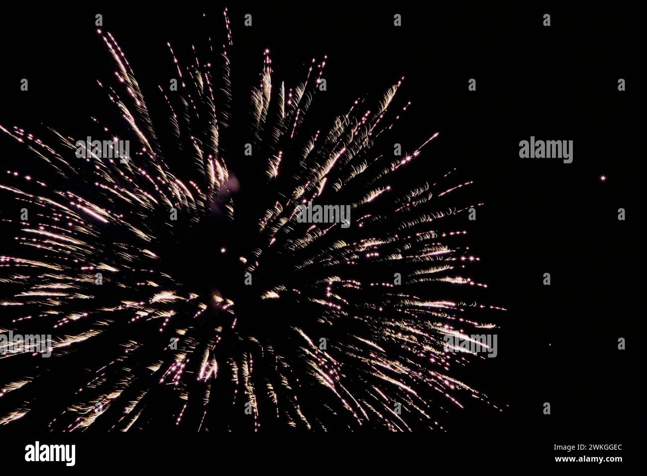 Purple and white fireworks with zoom motion effect in night sky Stock ...