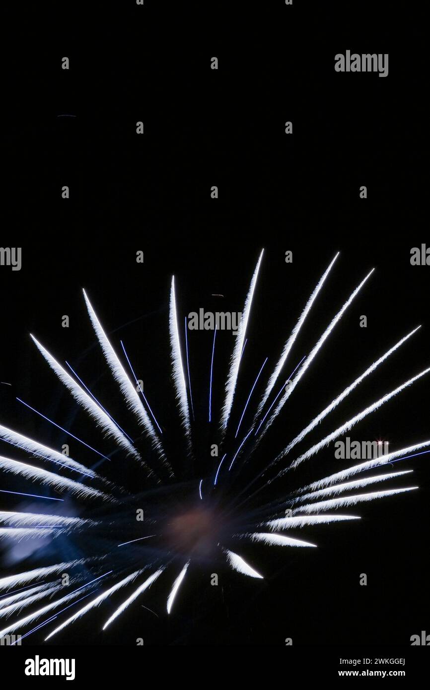 White and blue fireworks with zoom motion effect in night sky Stock ...