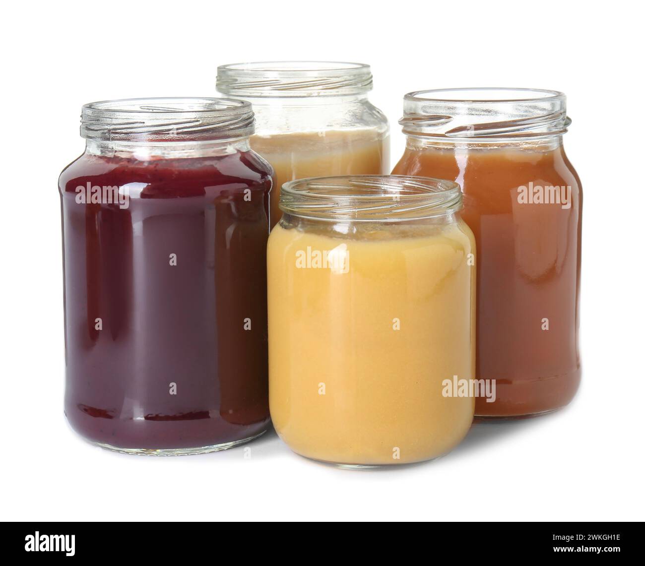 Baby food. Different healthy puree in jars isolated on white Stock ...