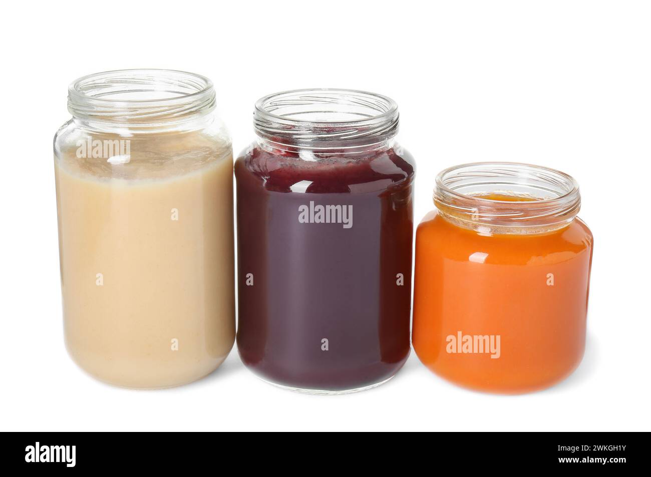 Baby food. Different healthy puree in jars isolated on white Stock ...