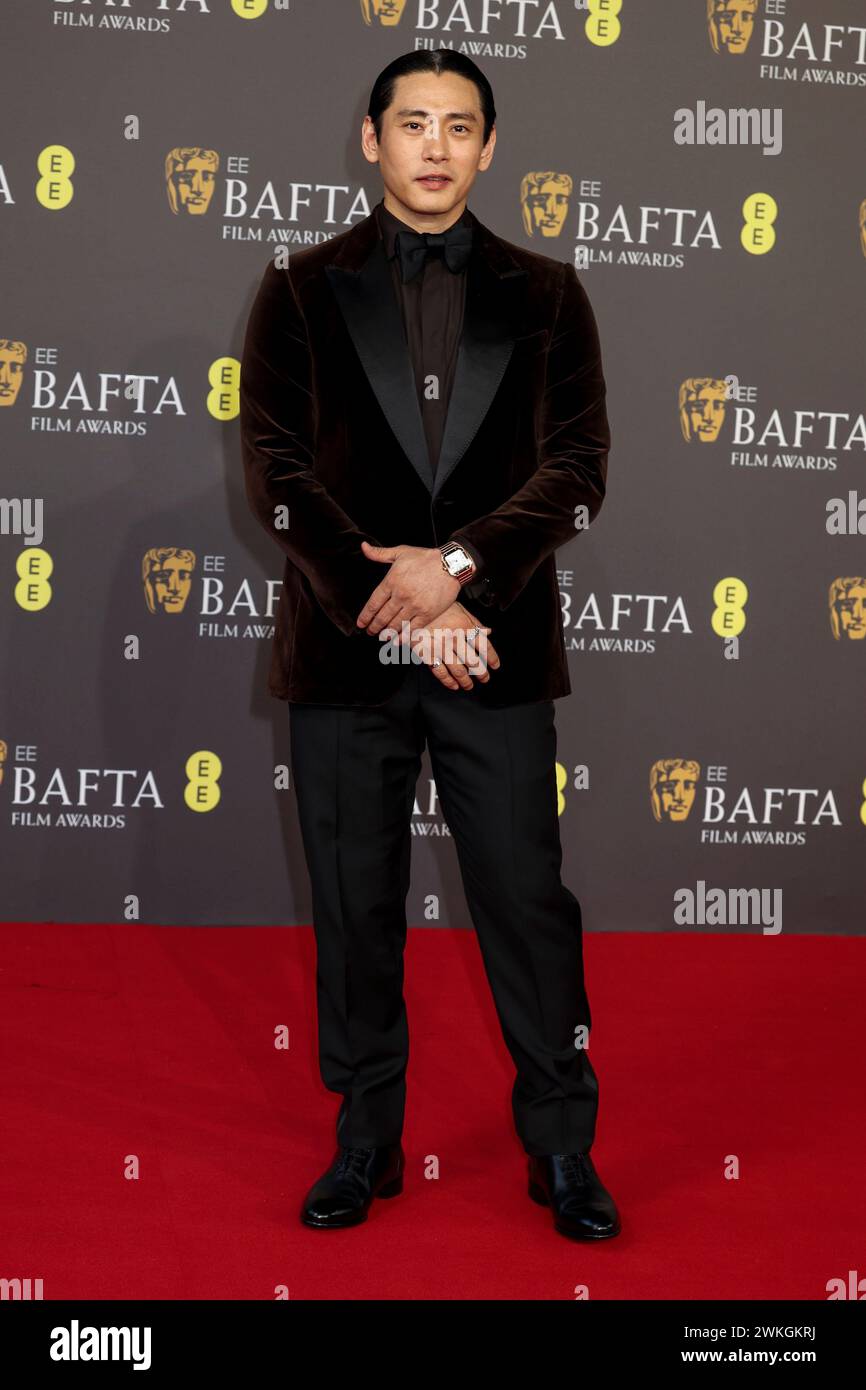 Teo Yoo attends the British Academy Film Awards 2024 at the Royal ...