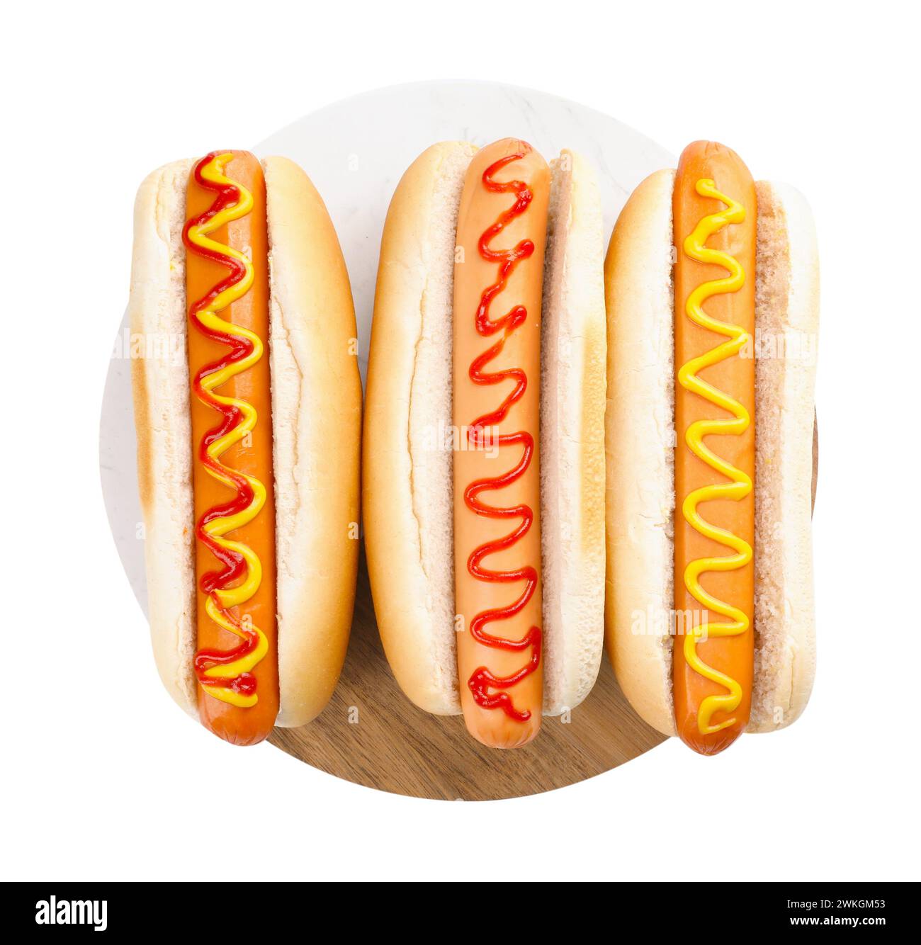 Delicious hot dogs with sauces isolated on white, top view Stock Photo ...