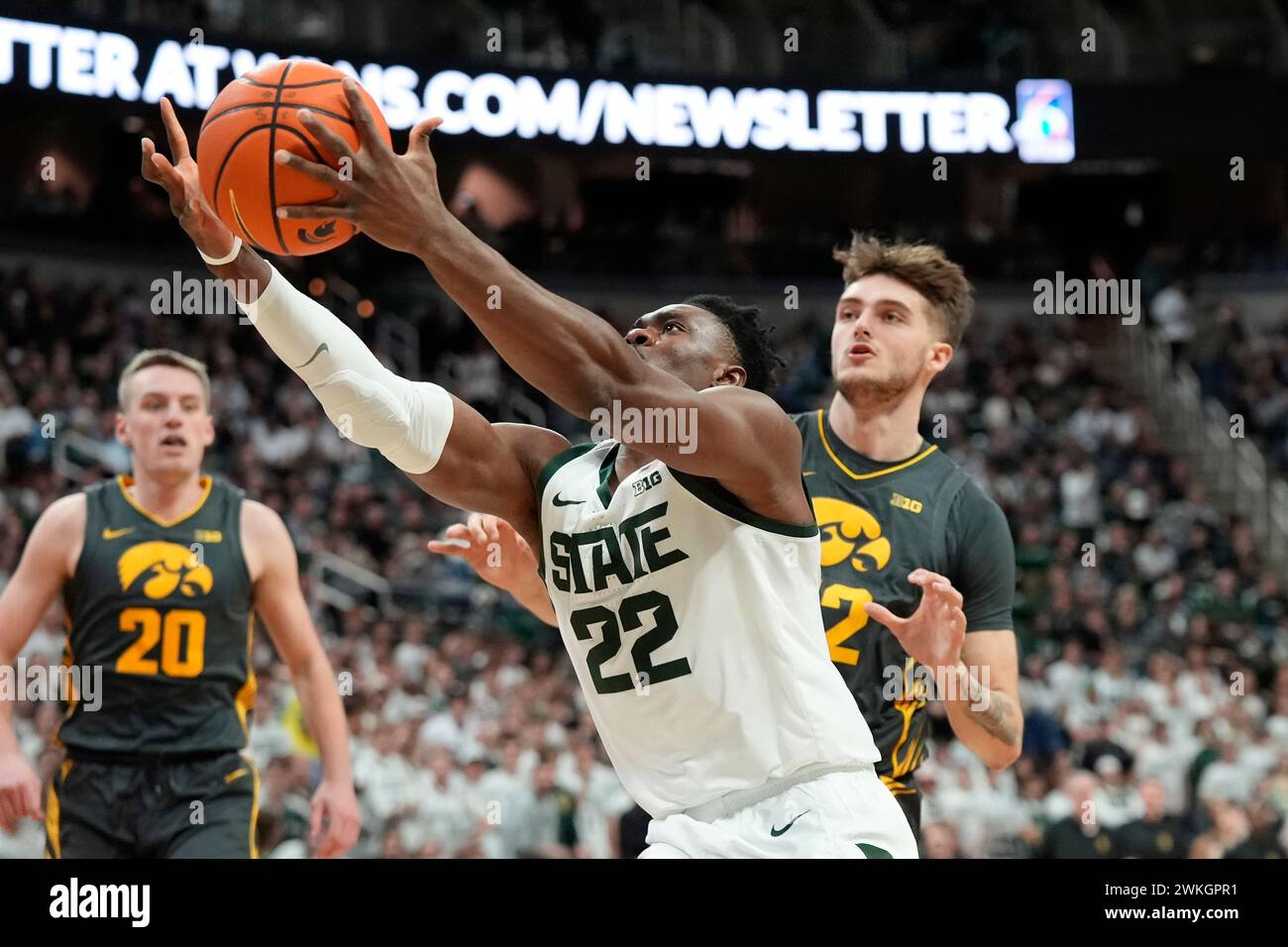 Michigan State center Mady Sissoko (22) grabs a rebound as Iowa forward ...