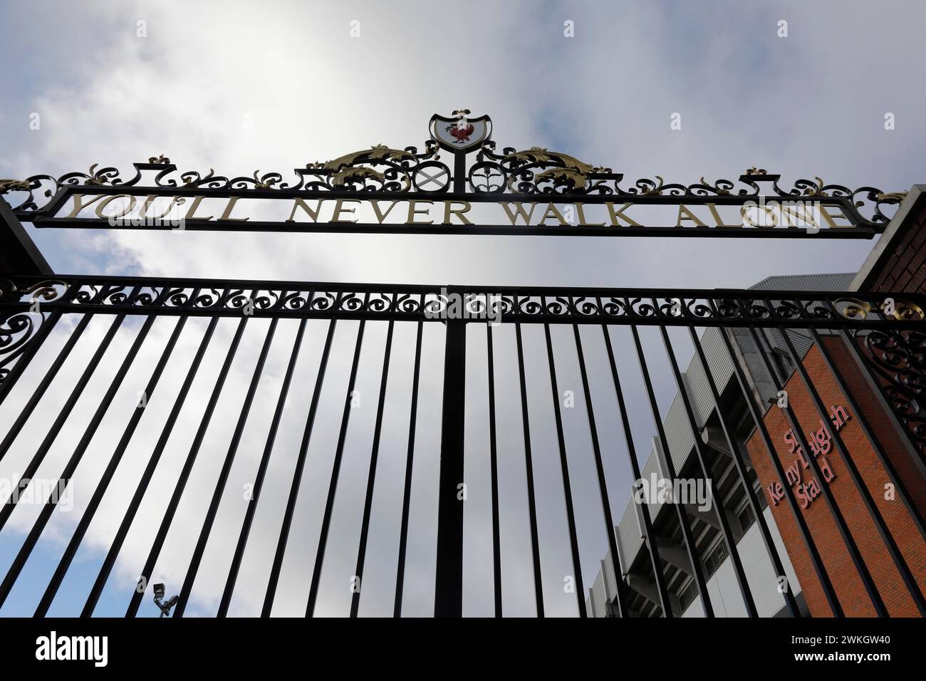 Entrance gate to Liverpool FC's Anfield stadium with the slogan You'll ...