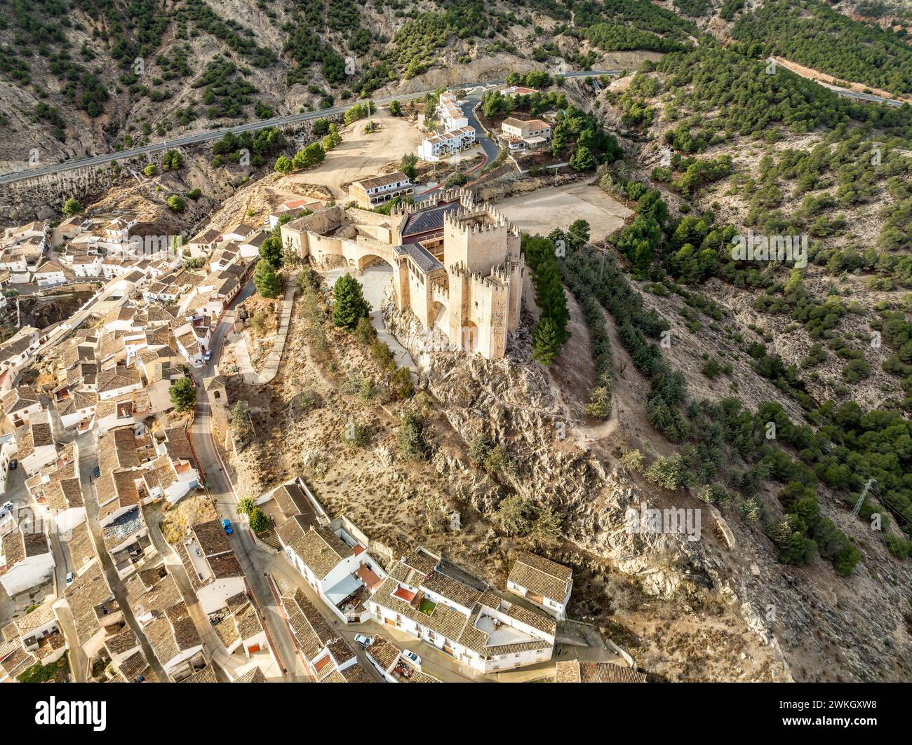 Aerial view of Velez Blanco castle on a hilltop and town with one or ...