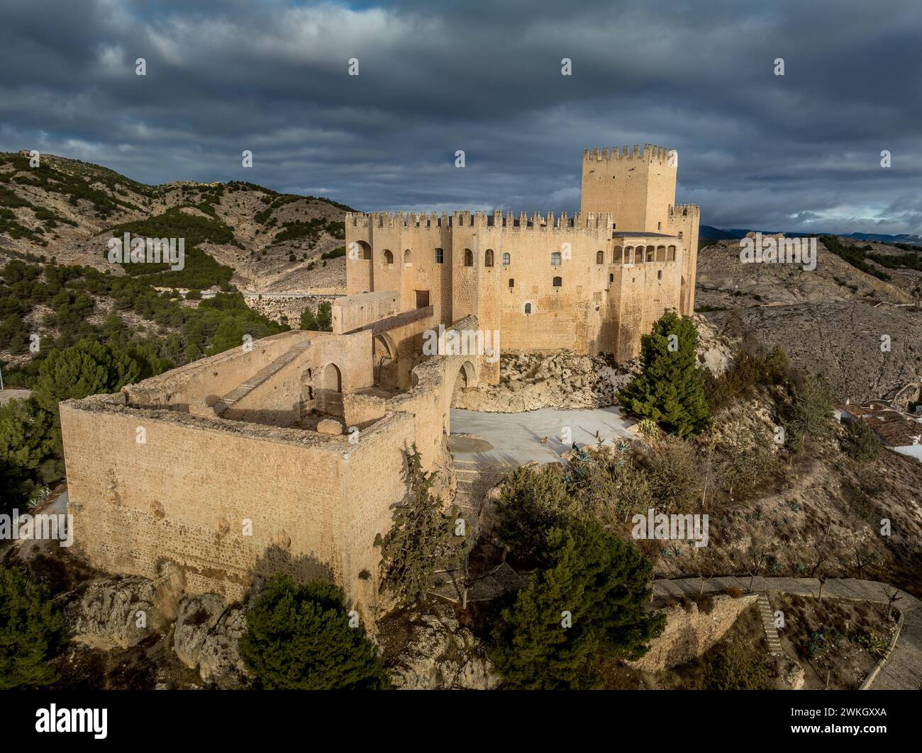 Aerial view of Velez Blanco castle on a hilltop and town with one or ...