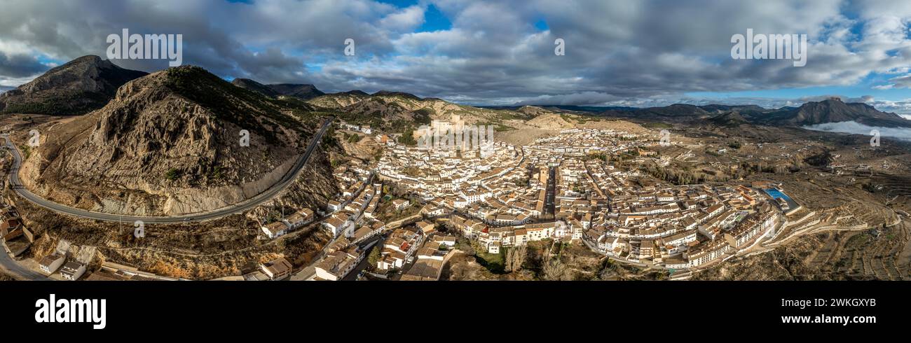 Aerial view of Velez Blanco castle on a hilltop and town with one or ...