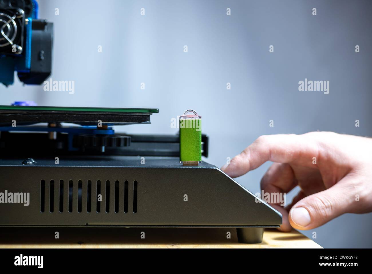 Hand touching screen of a 3d printer Stock Photo - Alamy