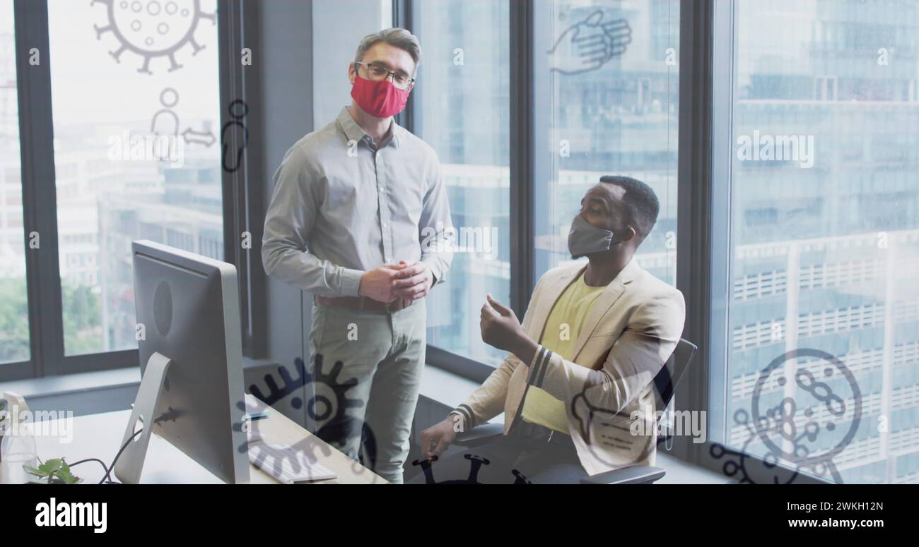 Image of virus icons over diverse businessmen with face masks talking ...