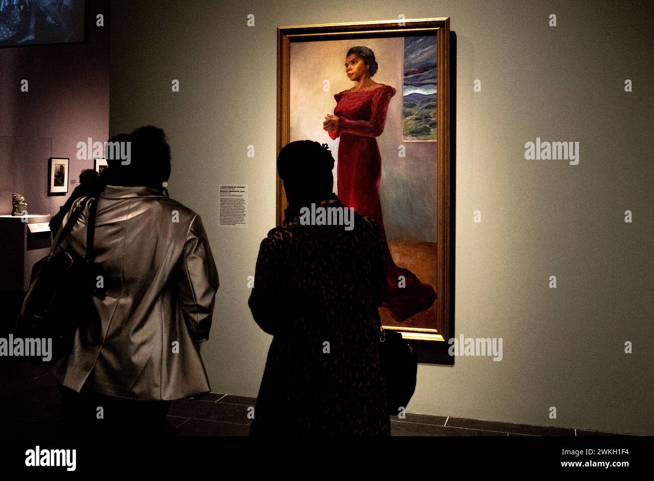 Visitors examine portrait of Marian Anderson by Laura Wheeler Waring on ...