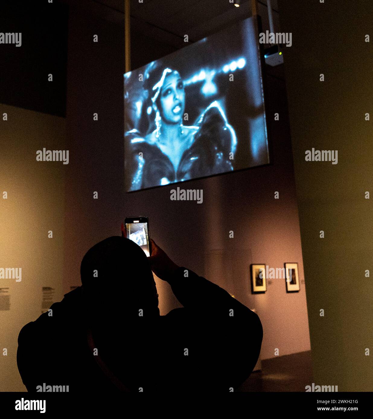 New York, USA. 20th Feb, 2024. A visitor take a photo of video clip of ...