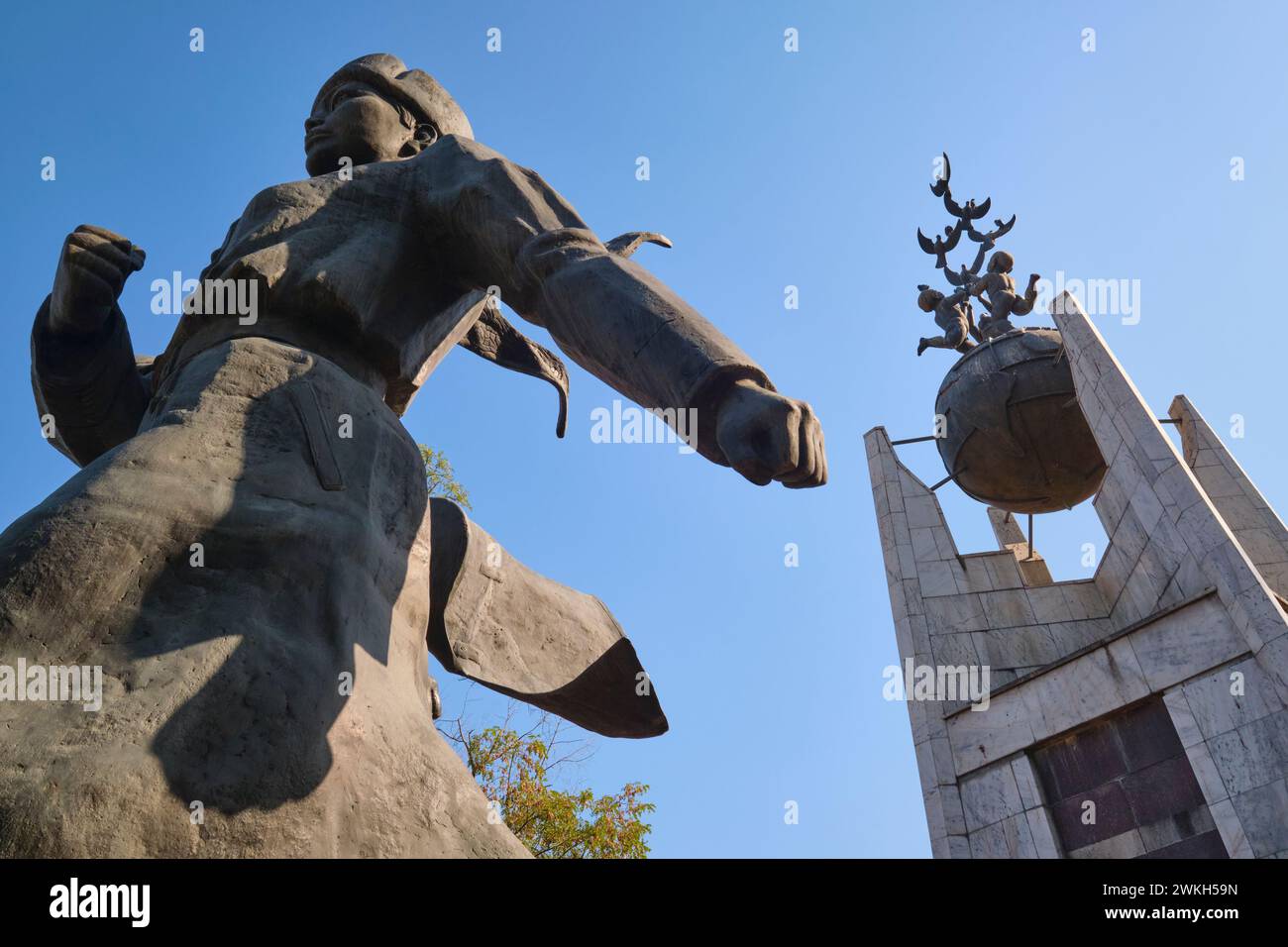 A view of the bronze statues and sphere. At the sculpture memorial to ...