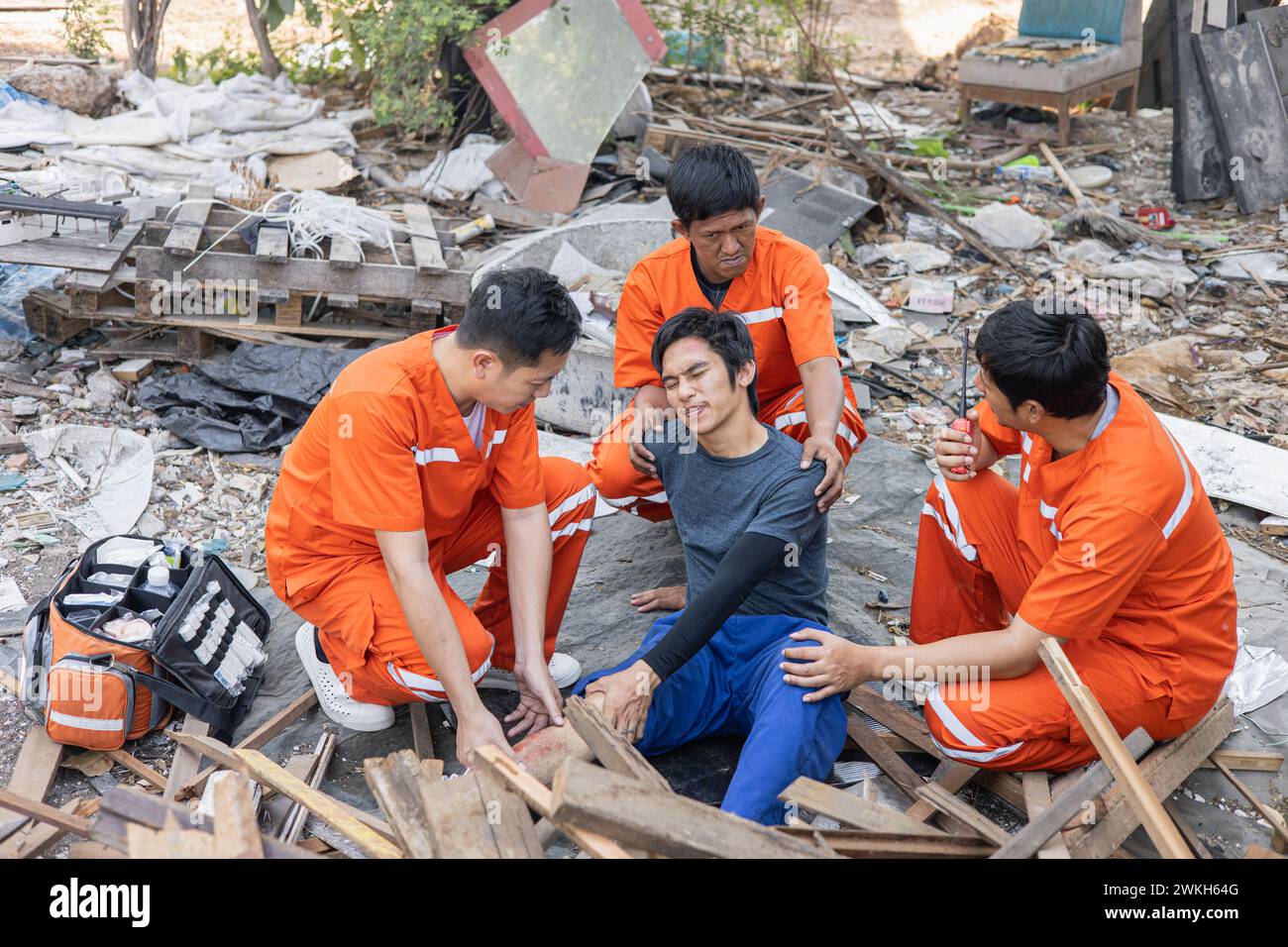 paramedic medical emergency team working help labor accident at dirty ...