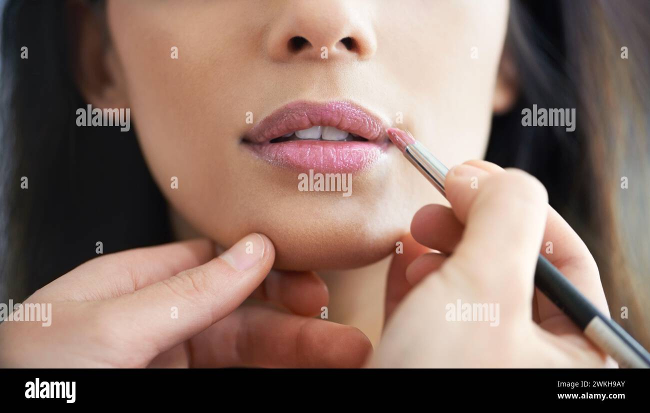 Hands, lipstick and makeup artist of gloss on mouth, woman and skincare ...