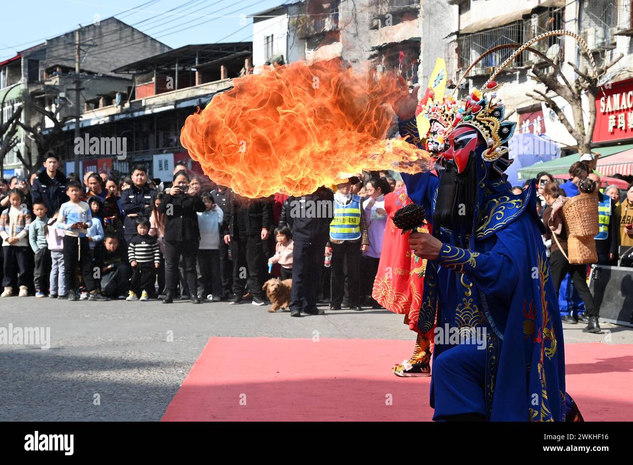 Actors perform during a folk parade in Dongxing District, Neijiang City ...