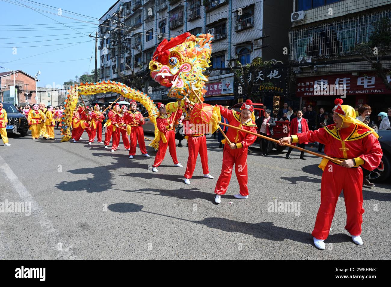 Actors perform during a folk parade in Dongxing District, Neijiang City ...