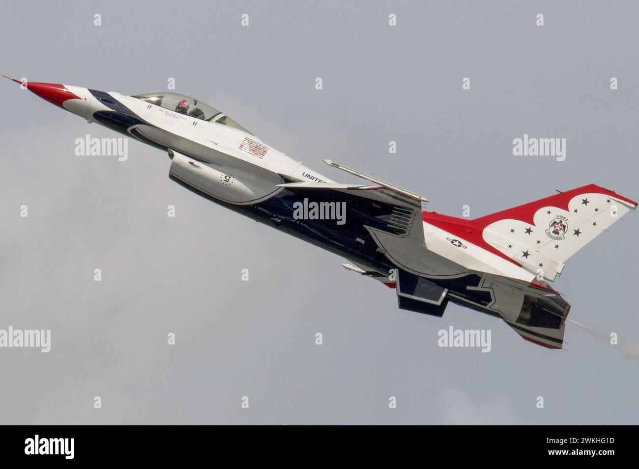 A sunny day with a fighter jet soaring through the sky Stock Photo - Alamy