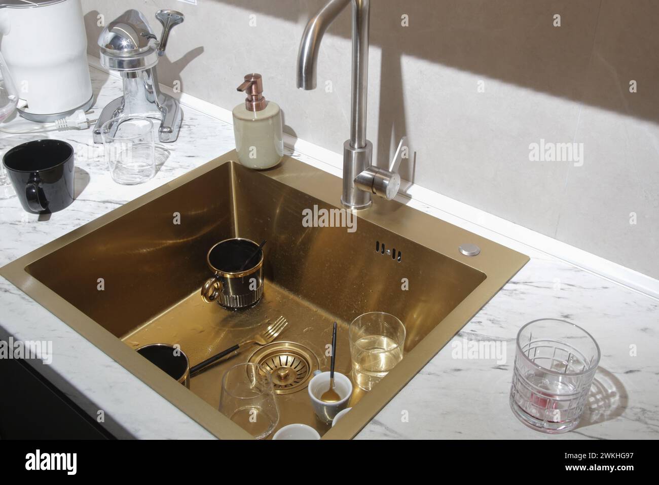 Dirty dishes in kitchen sink Stock Photo - Alamy