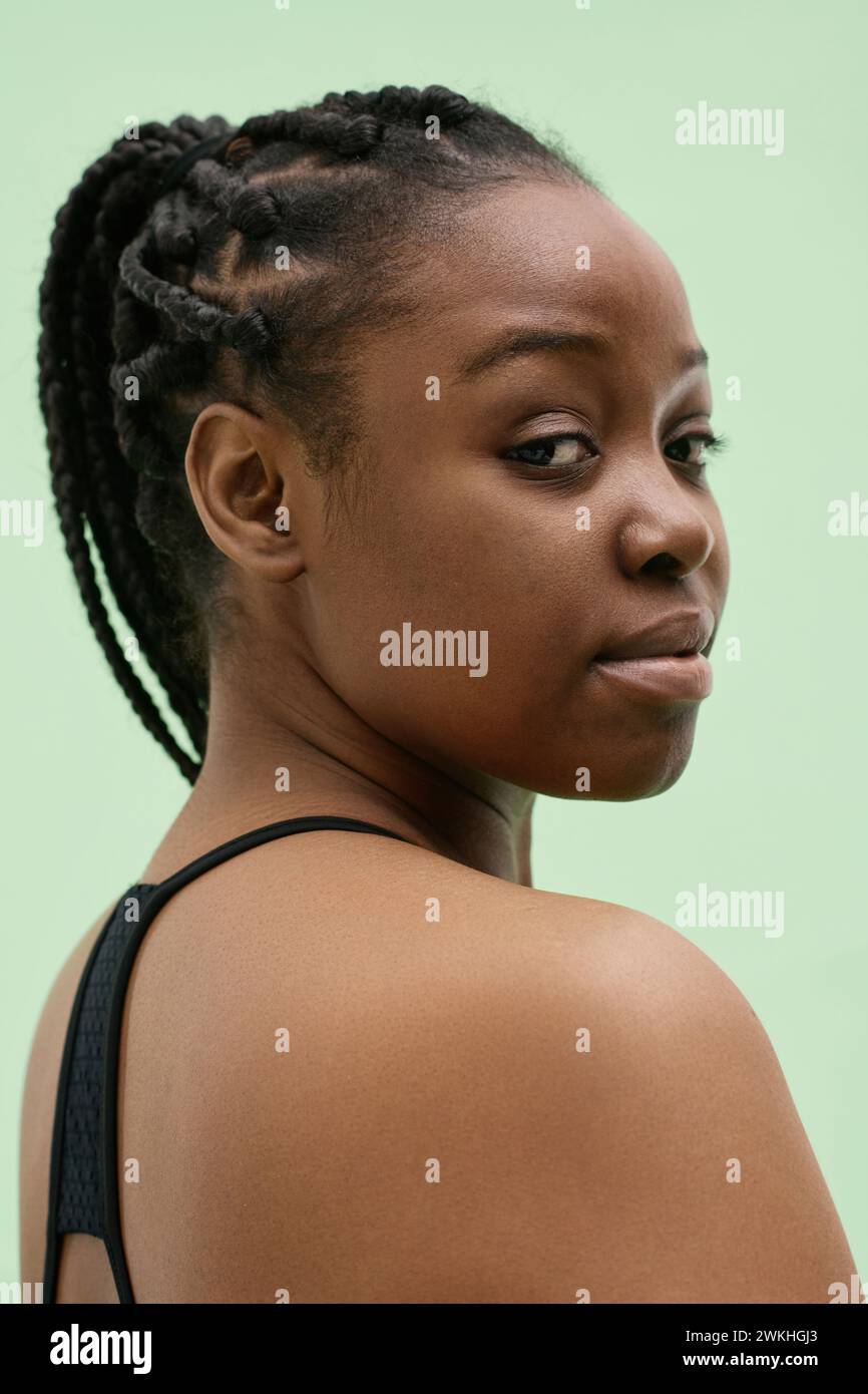 Vertical medium closeup portrait of confident young Black woman with ...