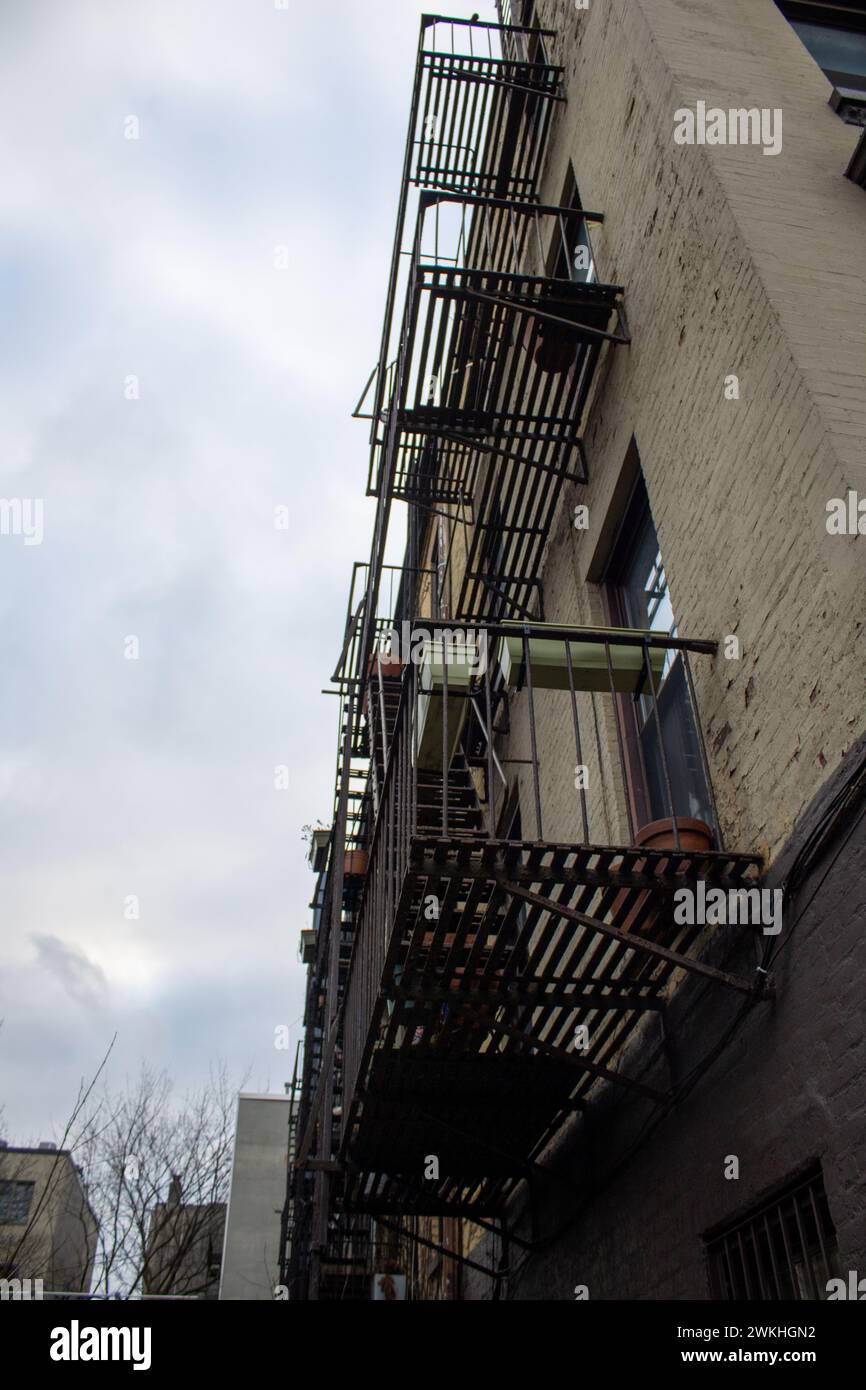 Two adjacent buildings with a staircase nestled between them Stock ...