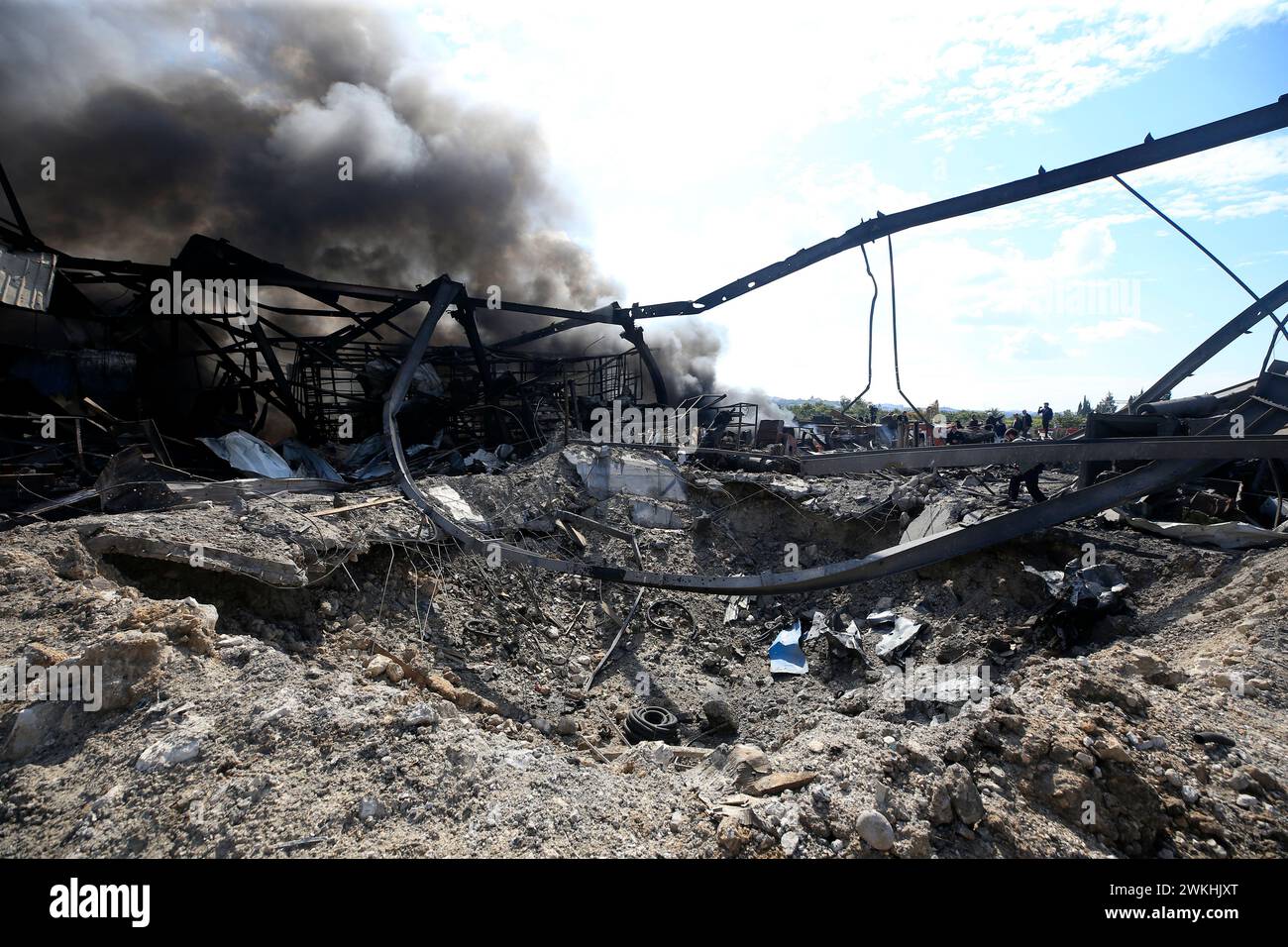 Ghazieh, Lebanon. 20th Feb, 2024. Heavy smoke is seen at a factory hit ...