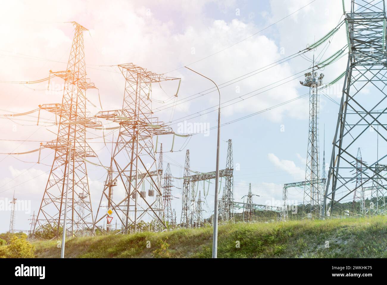 High voltage towers with sky background. Power line support with wires ...