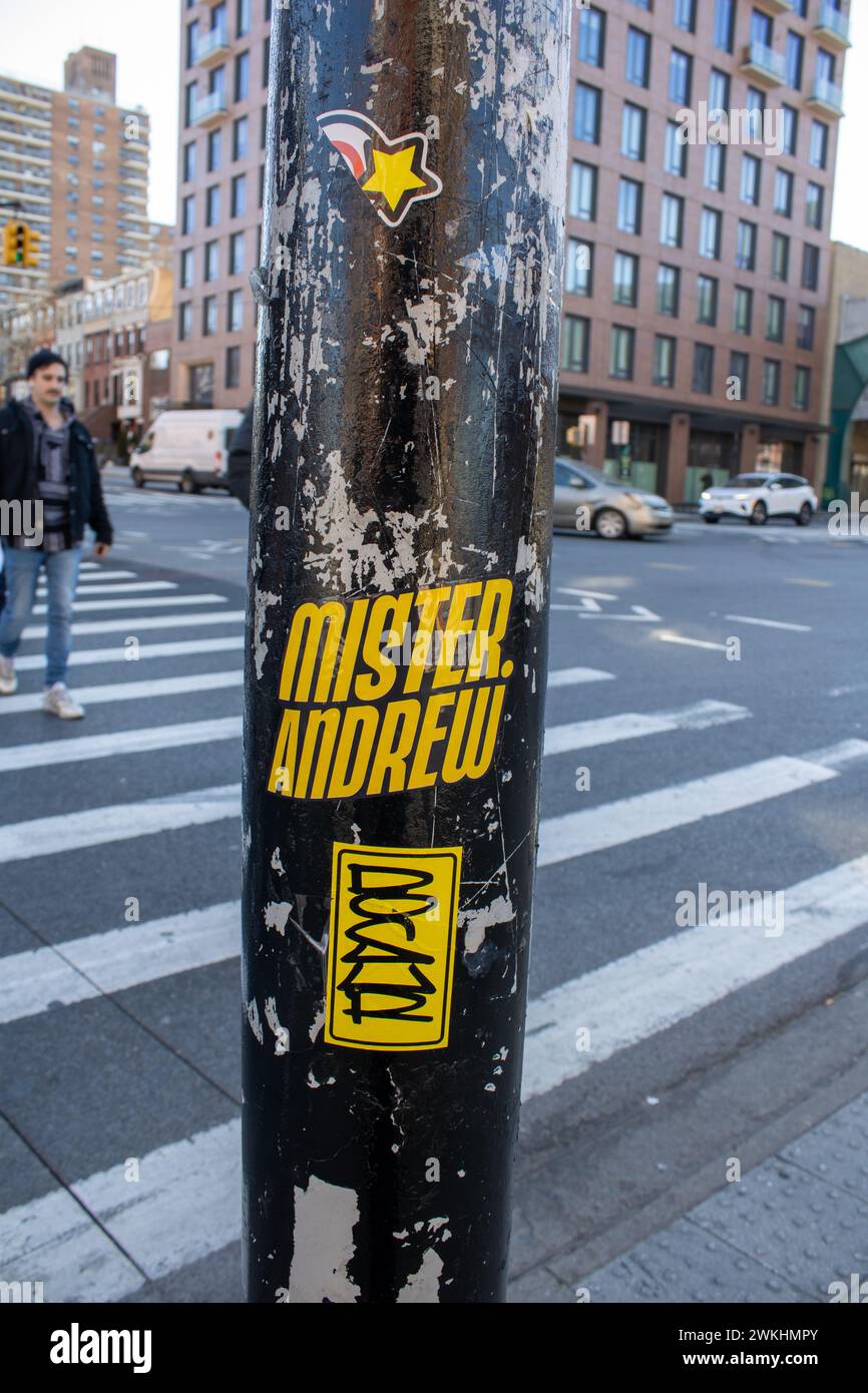 The colorful stickers covering a street pole in New York City, USA ...