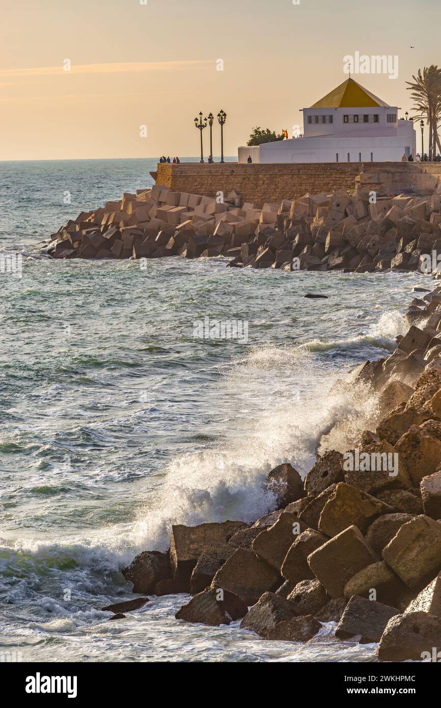 A scenic view of a beach with prominent shoreline buildings in Spain ...