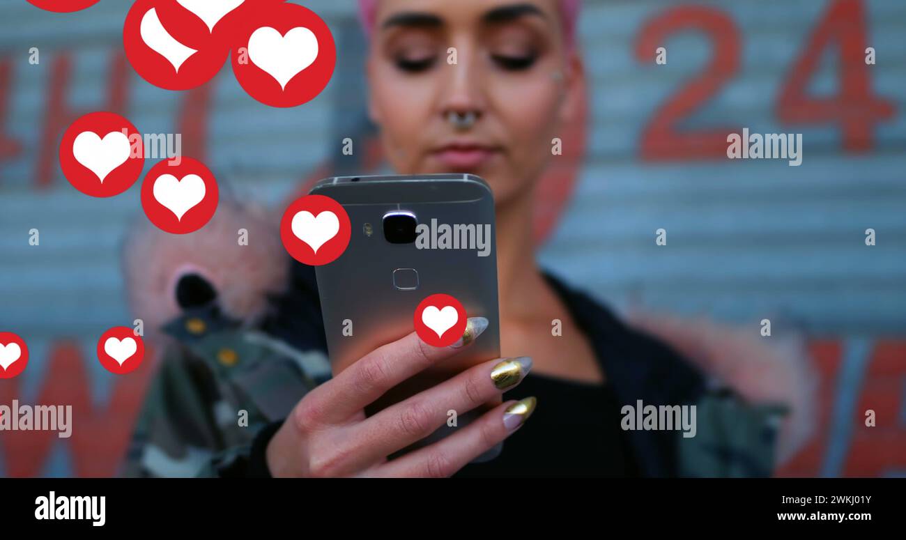 Image of falling social media icons over women using smartphone. social ...