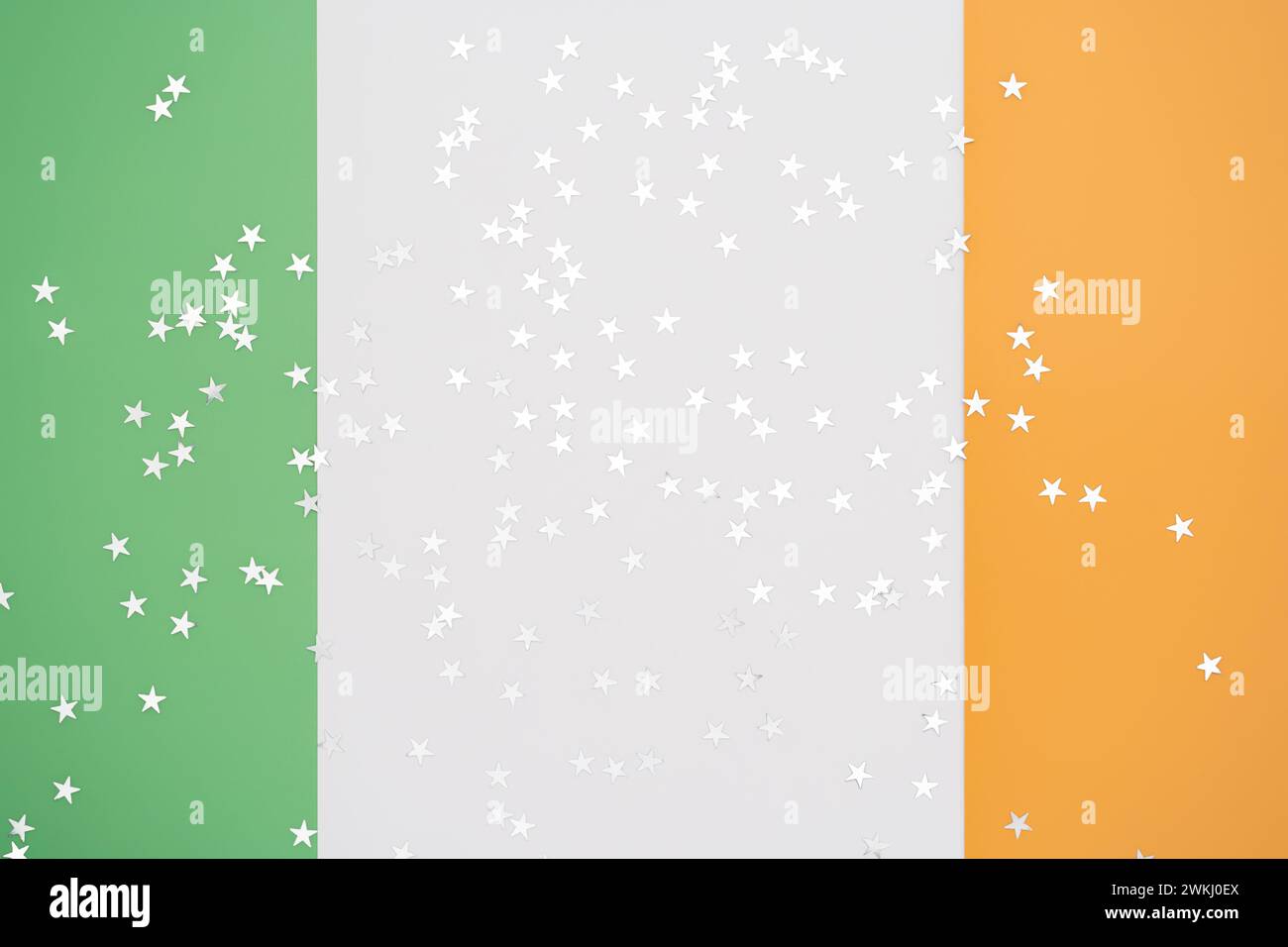 Irish flag made from color paper with silver star confetti. St Patrick ...
